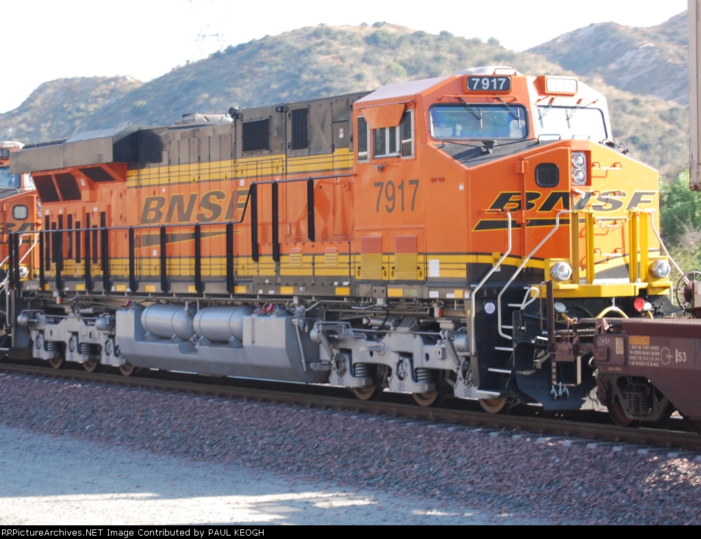 BNSF 7917 rolls past me as she decends Cajon Pass going west towards San Bernardino, CA.